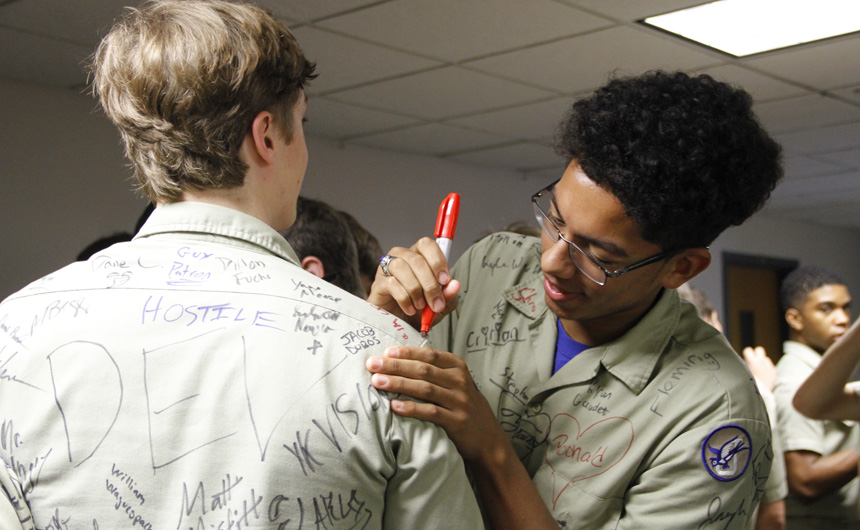 Seniors Share Autographs on Shirt Signing Day | Jesuit High School of ...