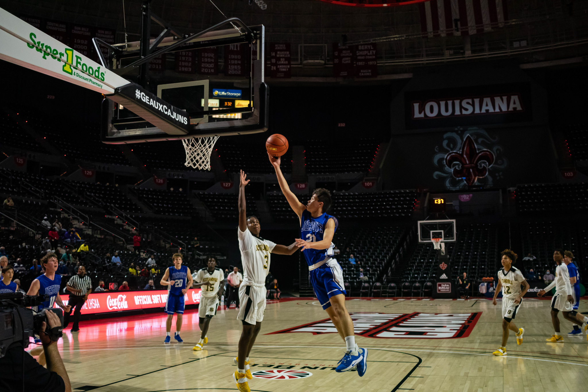 Basketball Fights Until The End, Falls to No.1 Scotlandville | Jesuit ...